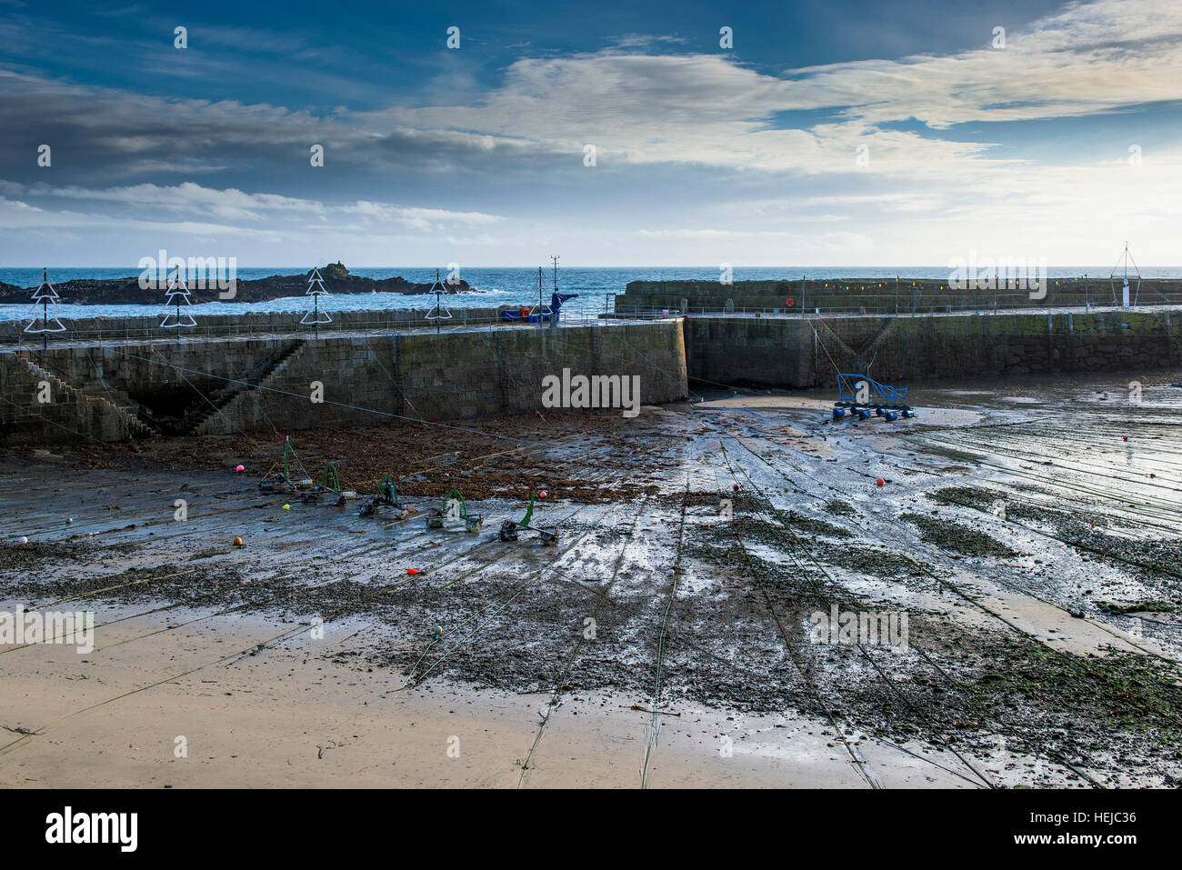 Low tide in Mousehole Harbour in Cornwall, England, UK Stock Photo - Alamy