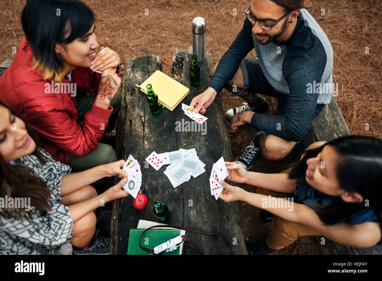 Friends Camping Playing Cards Concept Stock Photo - Alamy