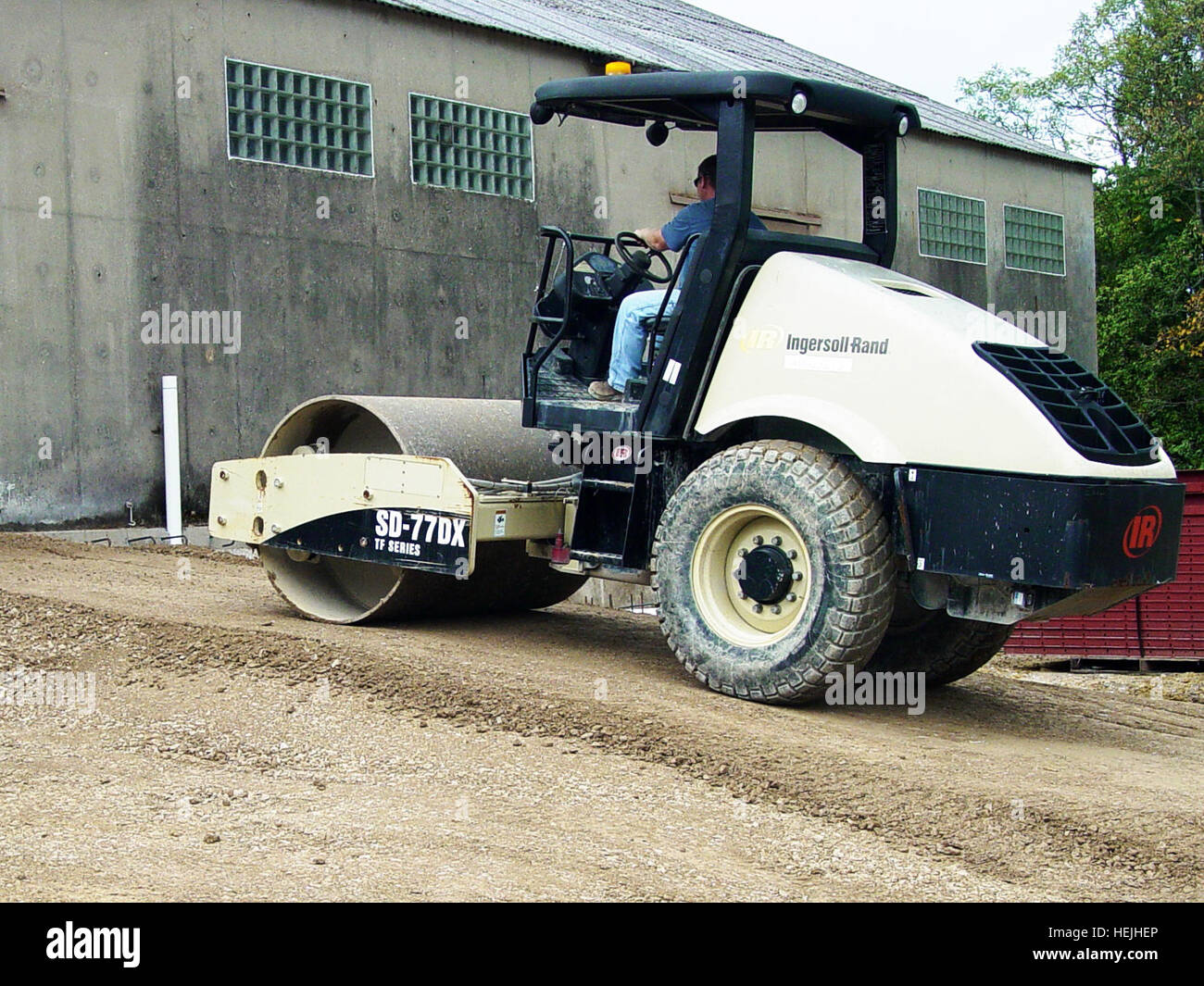 U.S. Army personnel construct a ramp to improve accessibility and ...