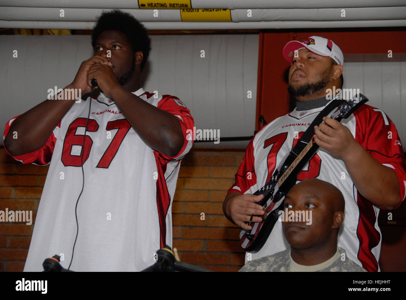 Arizona Cardinals G Herman Johnson, left, and G Deuce Lutui, right ...