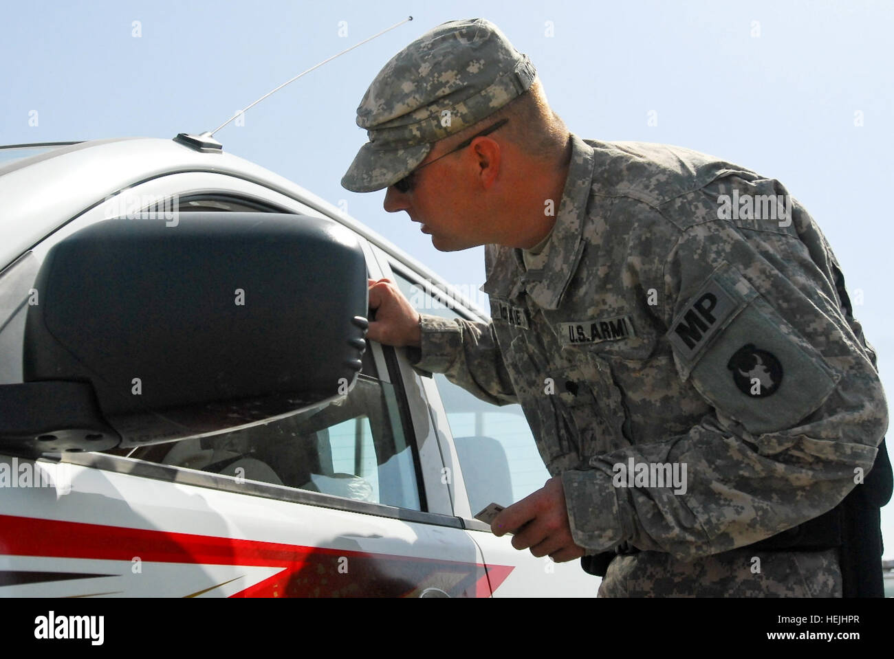 During a routine traffic stop, Spc. Robert McGrane, a patrol officer ...
