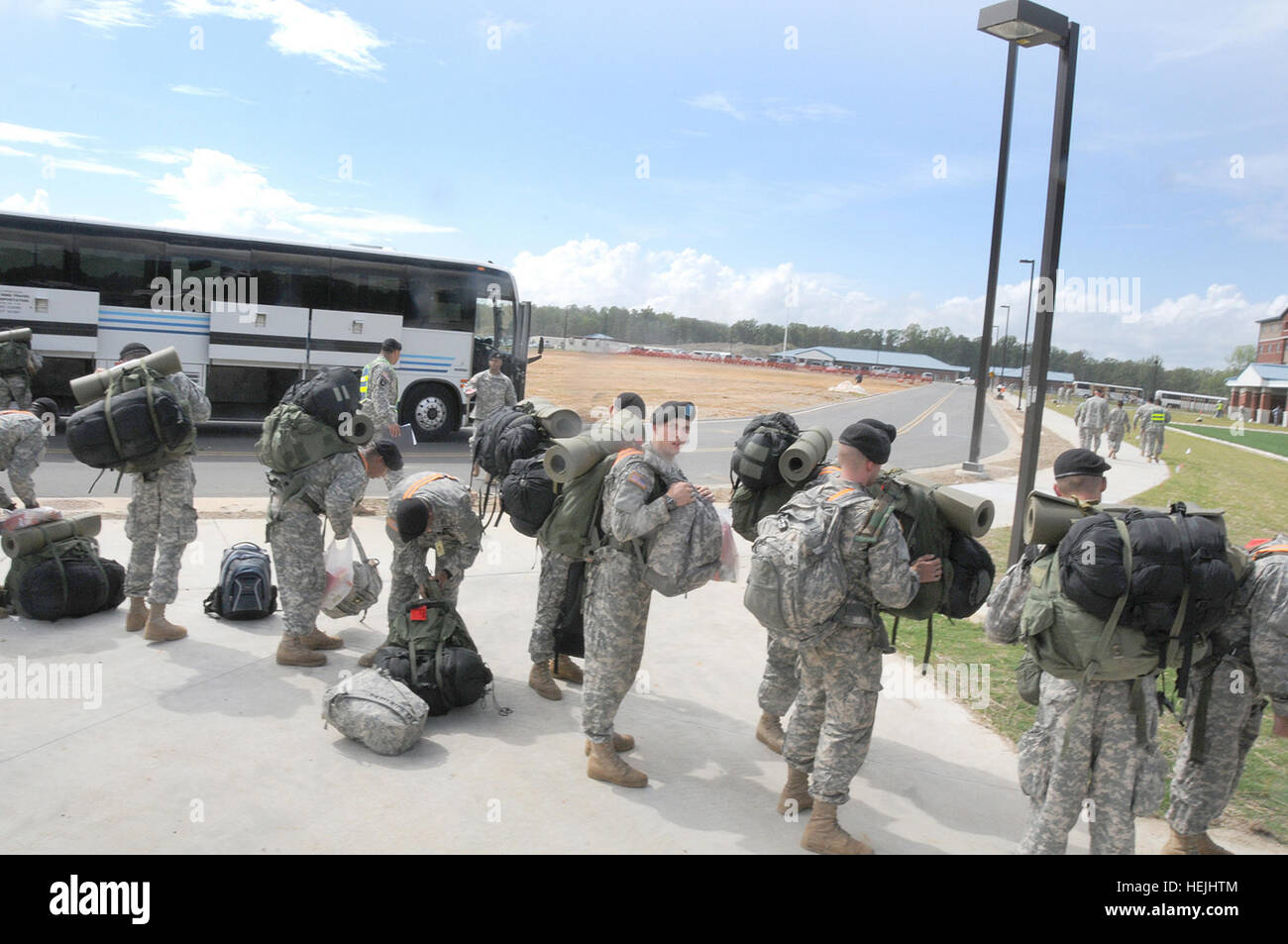 Ordnance advanced individual training Soldiers disembark buses that ...
