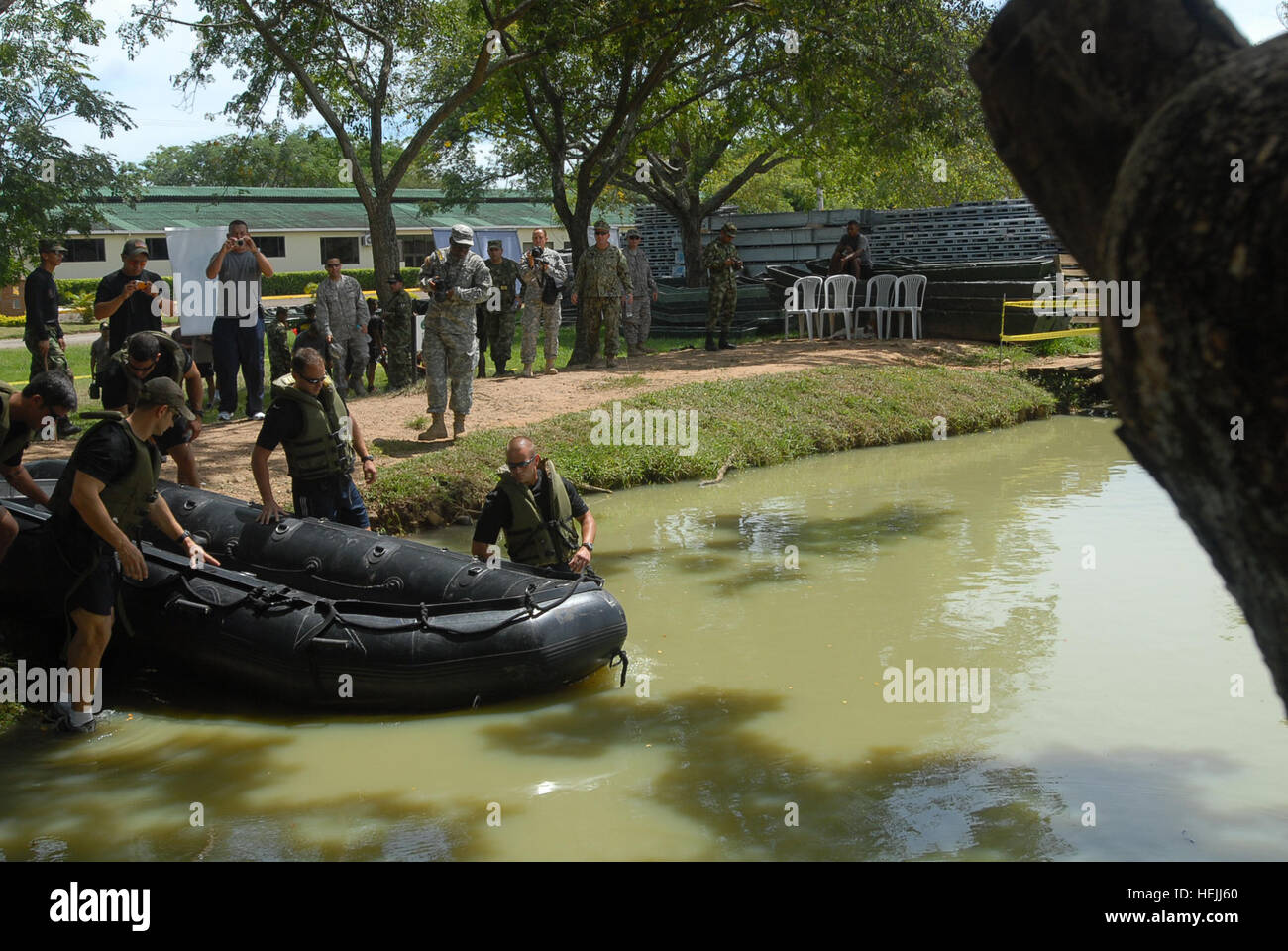 Members of the U.S. team practice rowing prior to the water event at ...