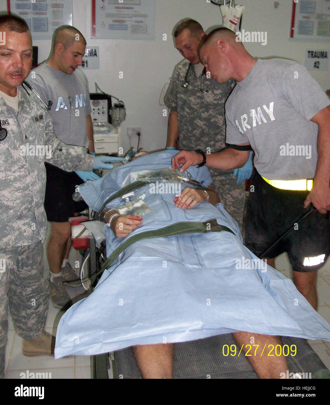 US Army 52315 15th Sustainment Brigade medics simulate treating a role ...