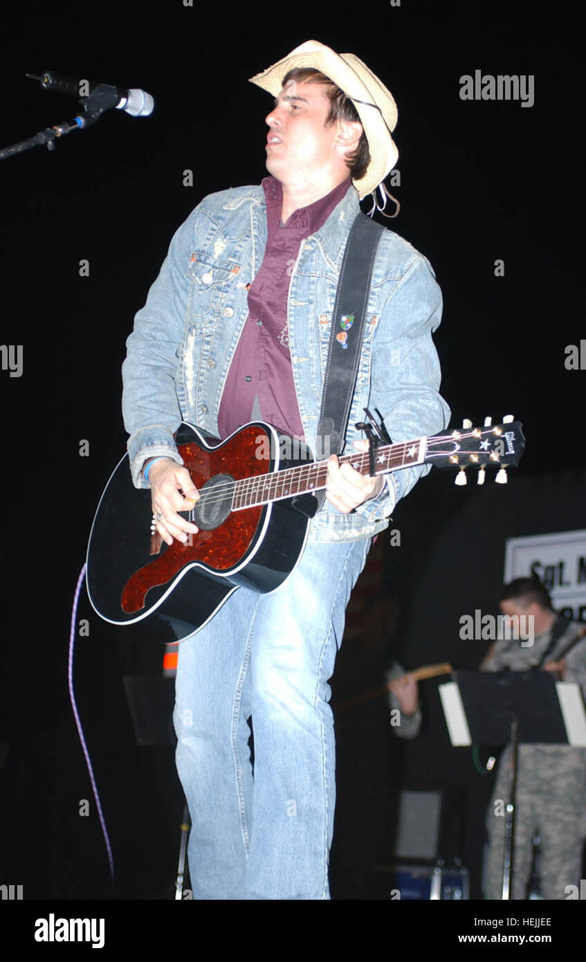 Country star Keni Thomas, a former Army ranger, performs a song he ...