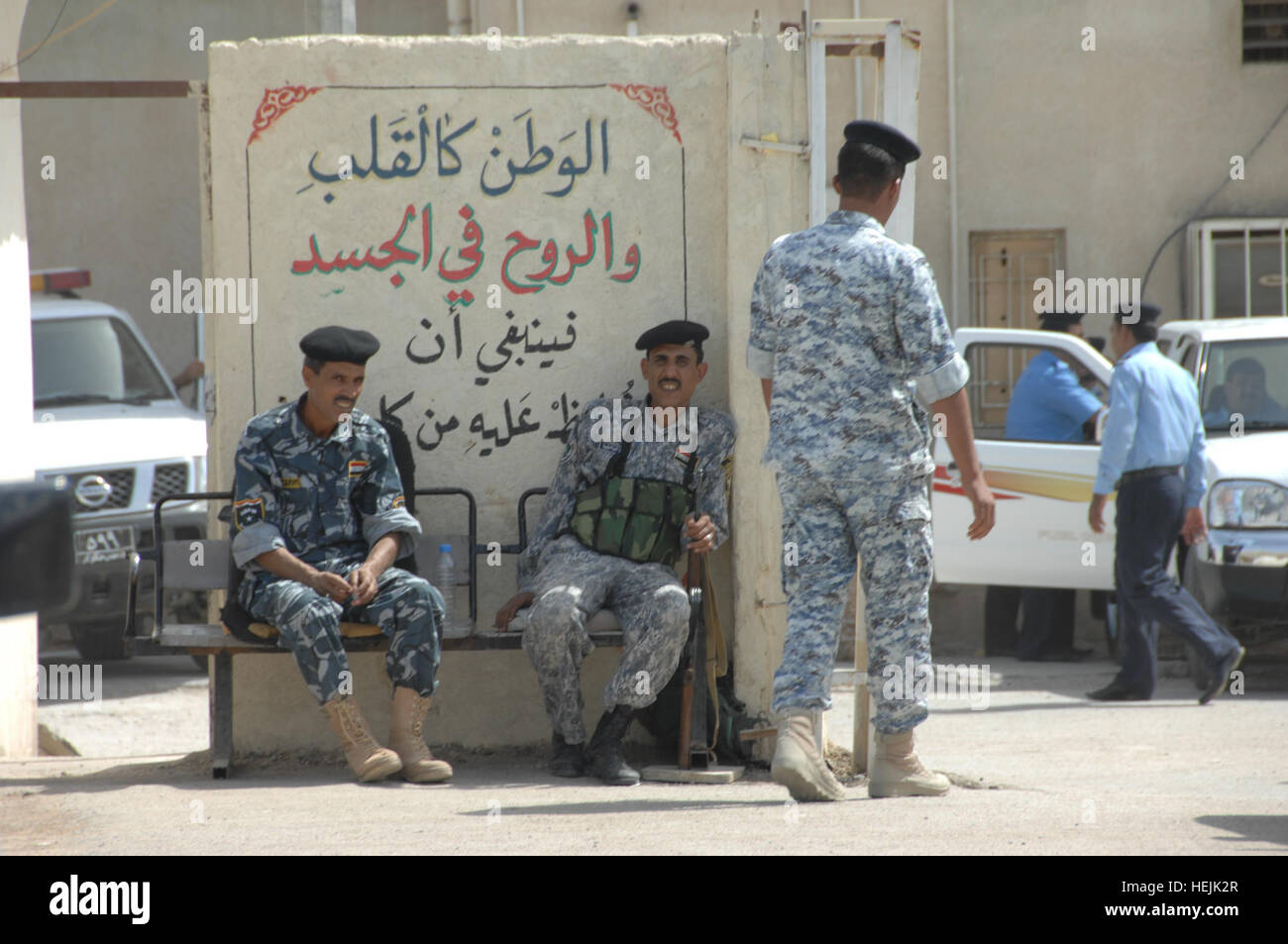 Iraqi police officers relax at the Provincial Joint Command Center, in ...