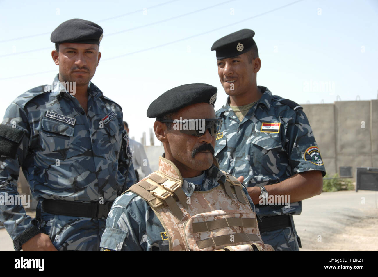 Iraqi police officers pause for a photo at the Provincial Joint Command ...
