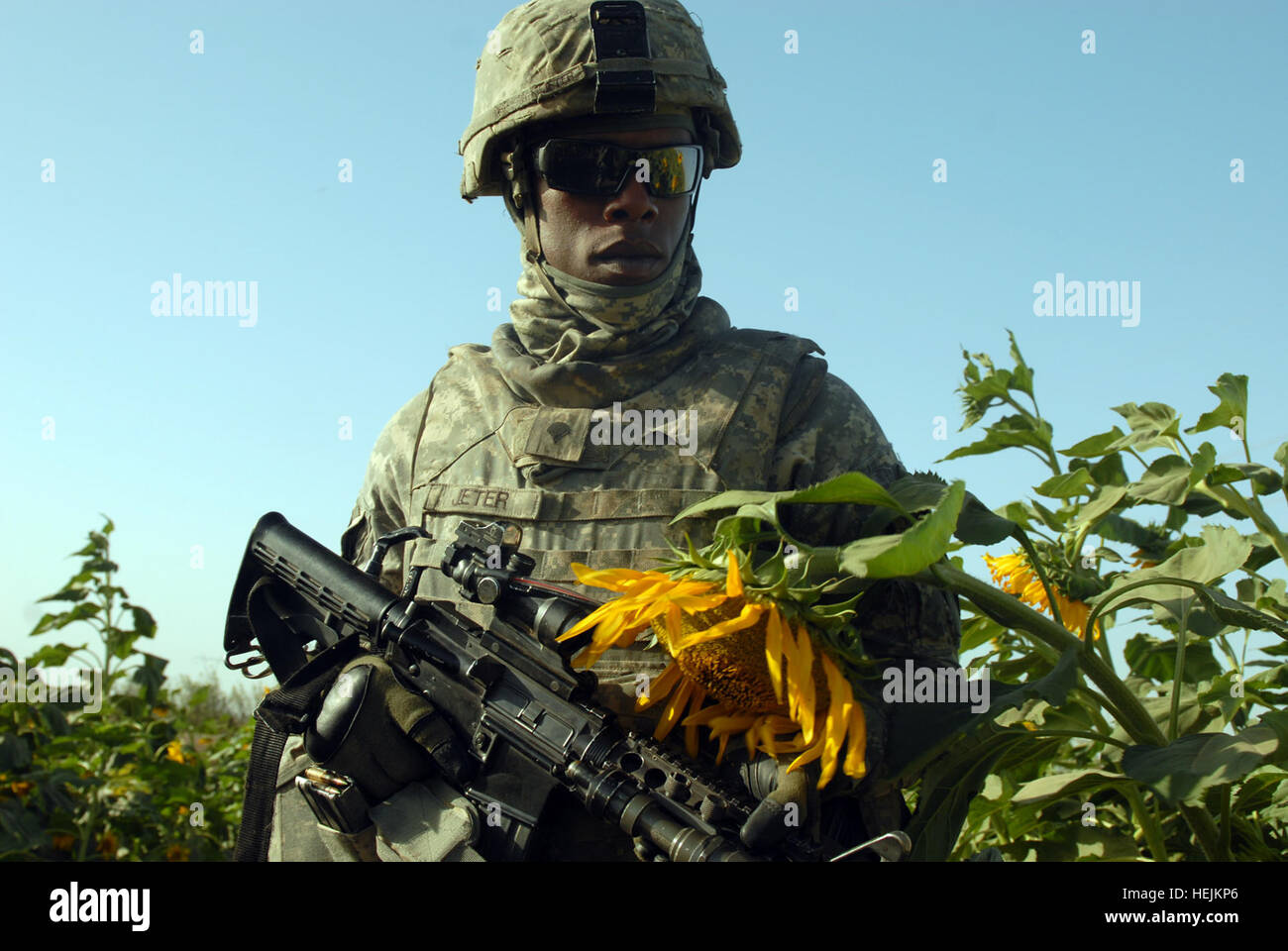 US Army 52938 TAJI, Iraq - Spc. Marcus Jeter, of Atlanta, walks through ...
