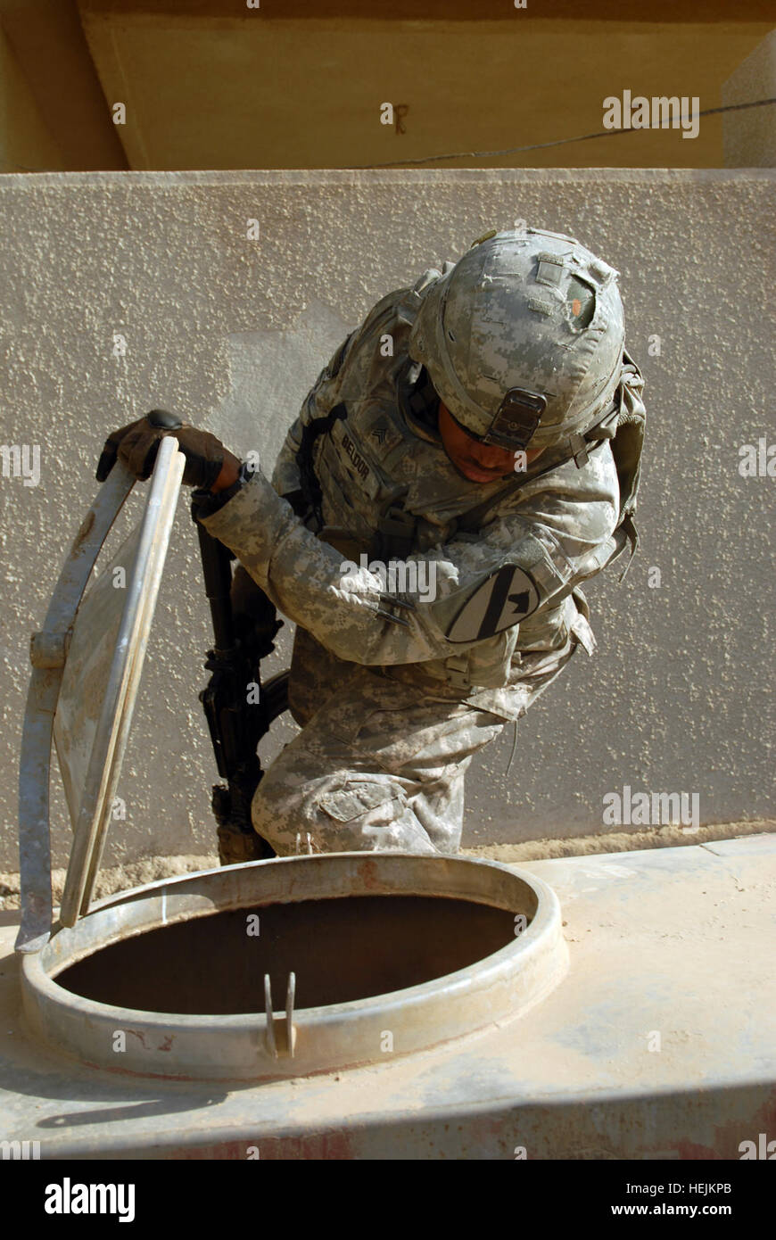 U.S. Army and Iraqi Army personnel conduct a joint patrol in the Taji ...