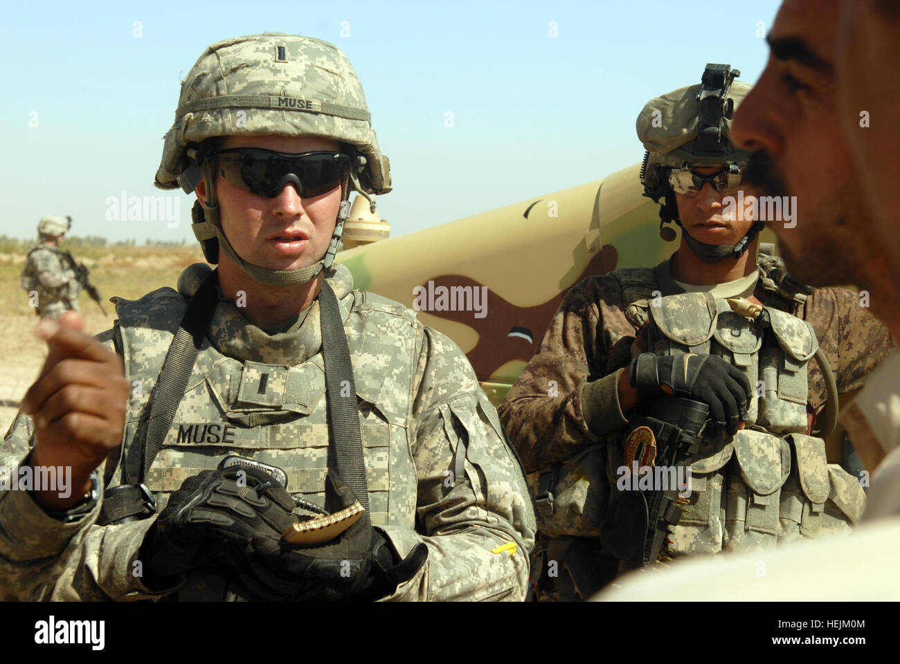 US Army 52922 BAGHDAD - First Lt. Peter Muse takes notes from Sons of ...