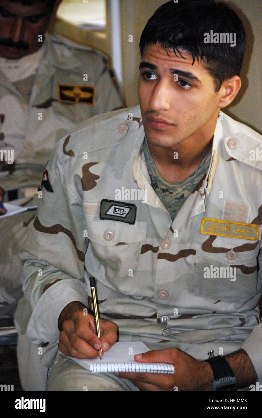 US Army 52952 CAMP TAJI, Iraq- An Iraqi Army soldier assigned to the ...