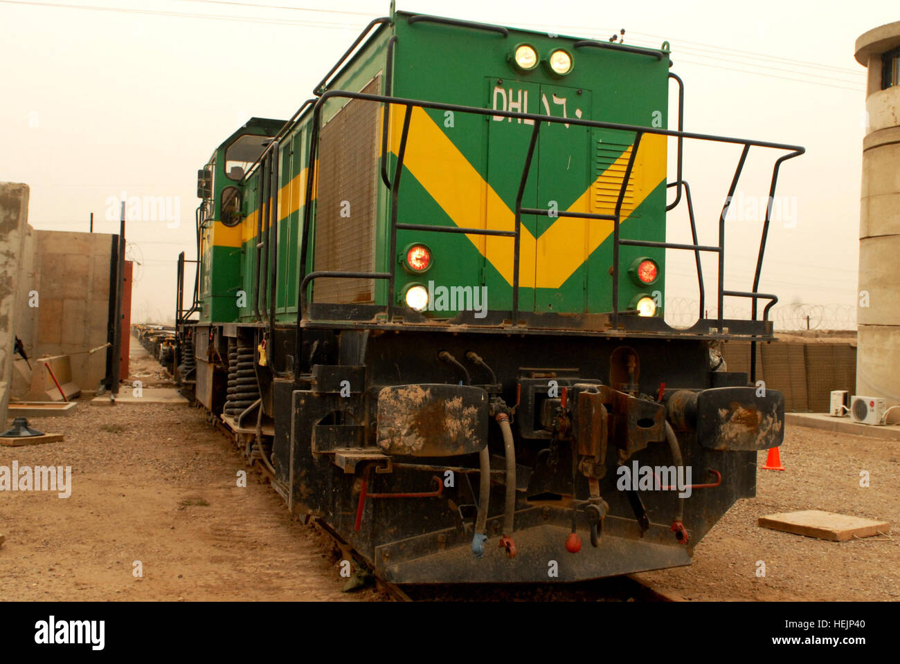 An Iraqi railroad locomotive arrives at Camp Taji on Feb. 10, to begin ...