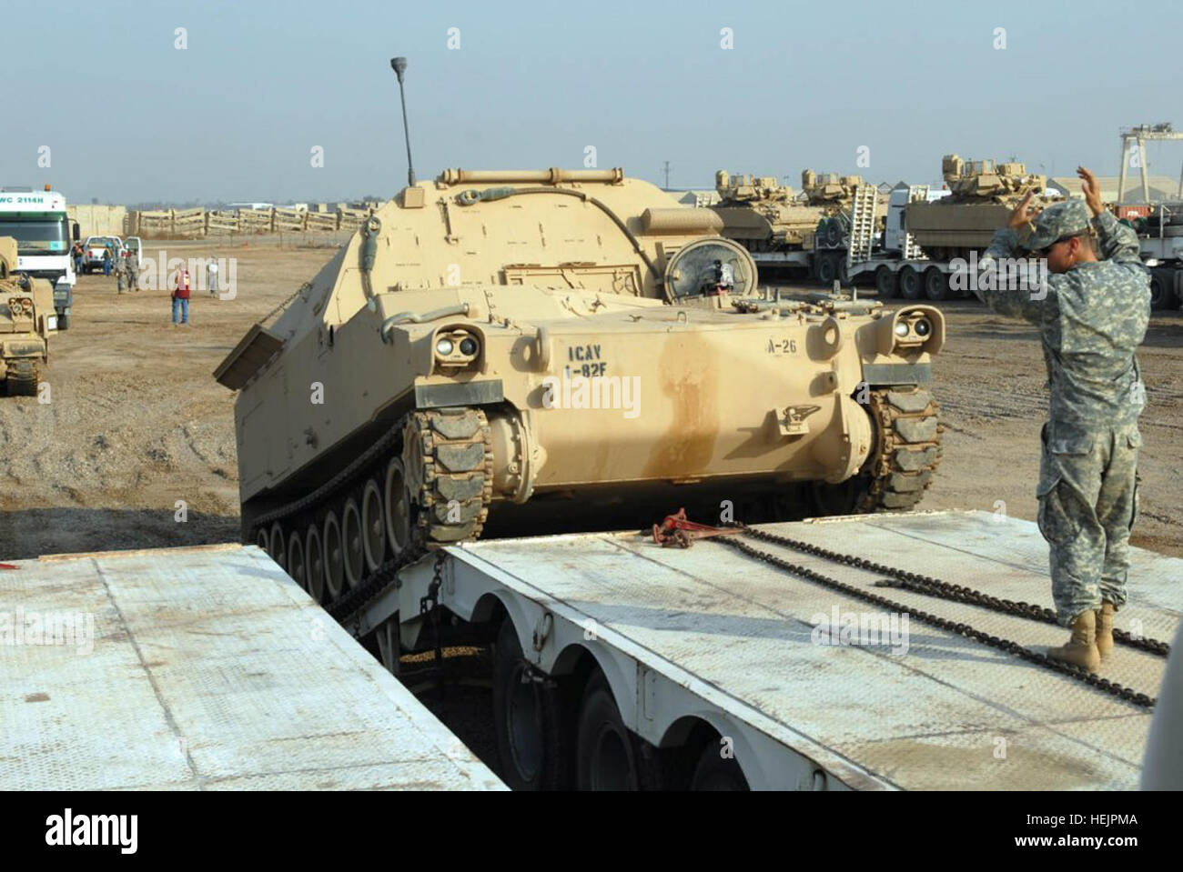 Los Angeles native, Pfc. Daniel Garcia, guides an M992 field artillery ...