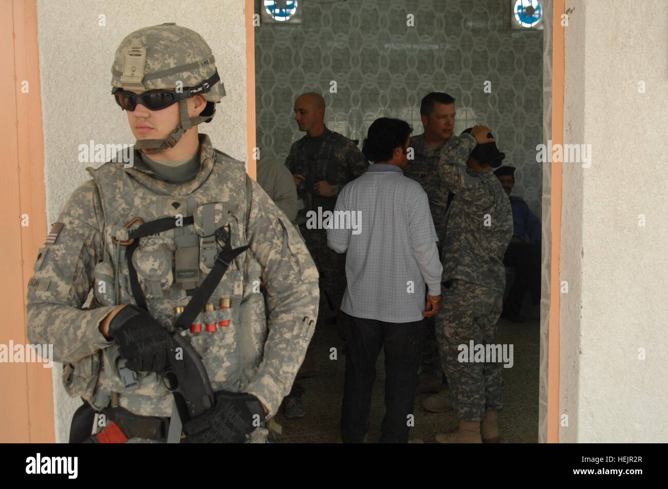 U.S. Army Spc. Steven Melson, attached to 3rd Platoon, 252nd Military ...
