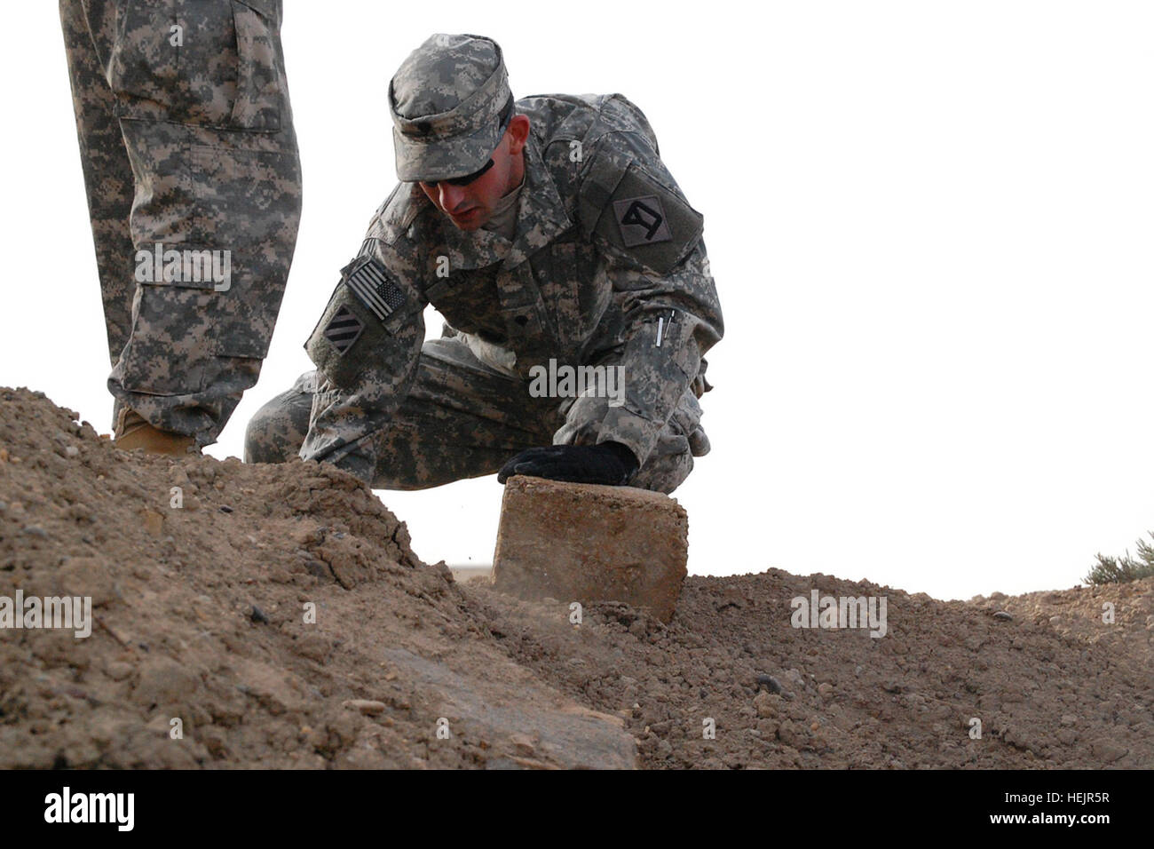 Setting up a marker on a simulated improvised explosive training device ...