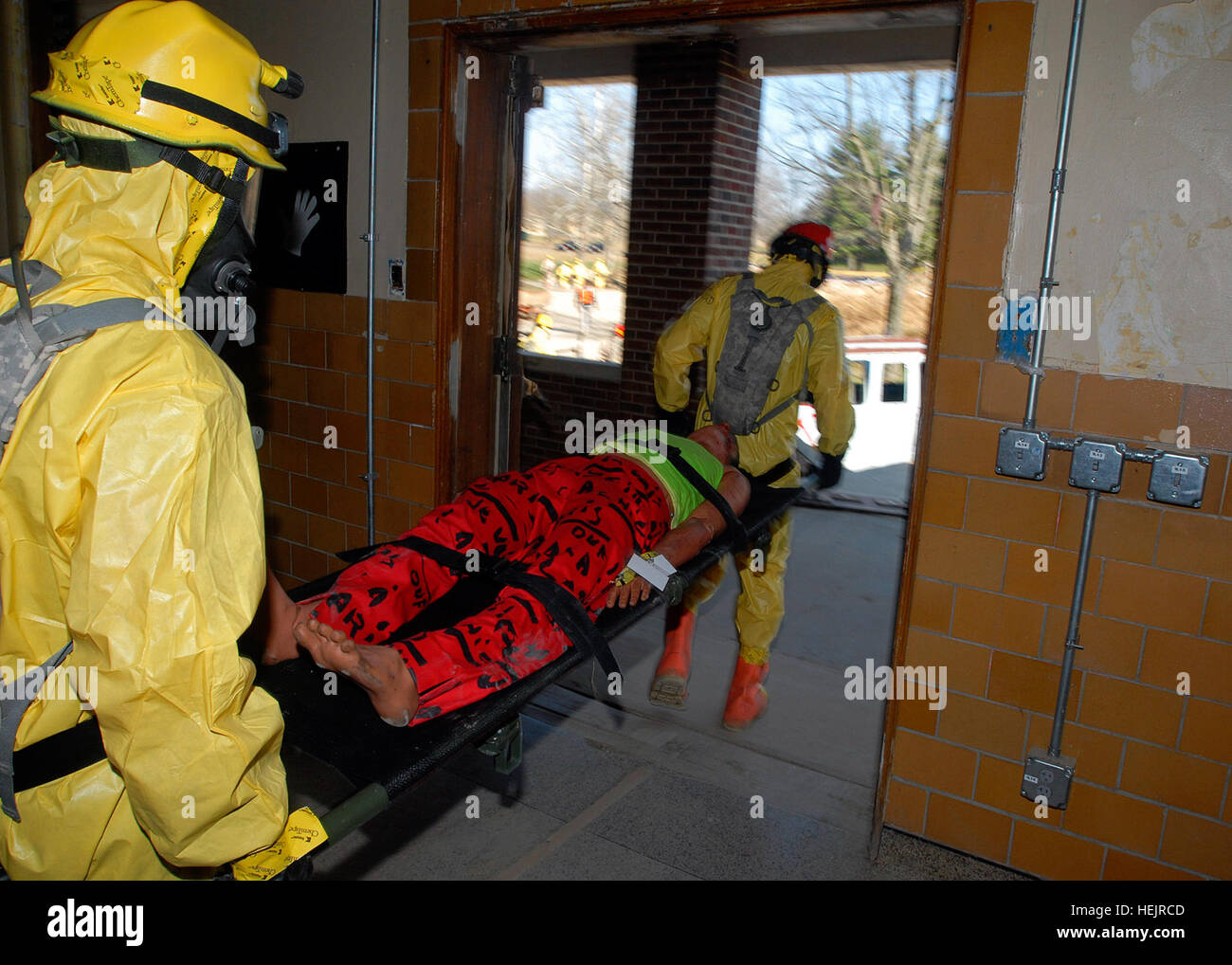 Ohio Air National Guard Airmen carry a mannequin simulated casualty on ...