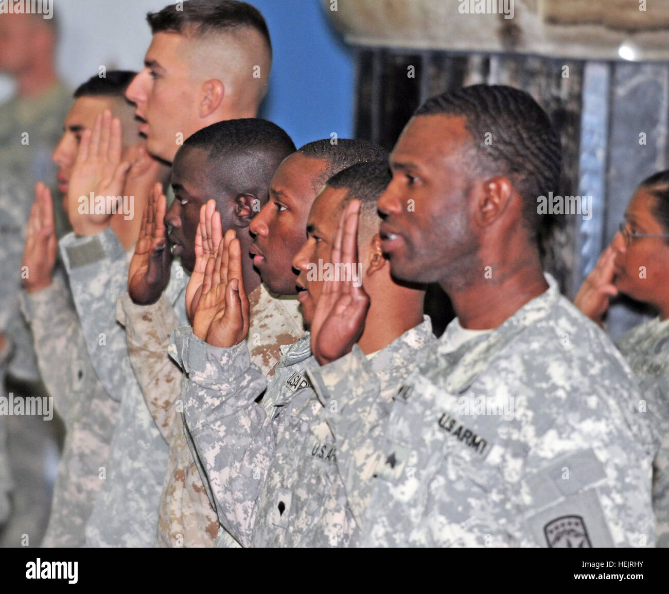 U.S. Marine Pfc. Sam Stanford Watts repeats the oath of allegiance to ...