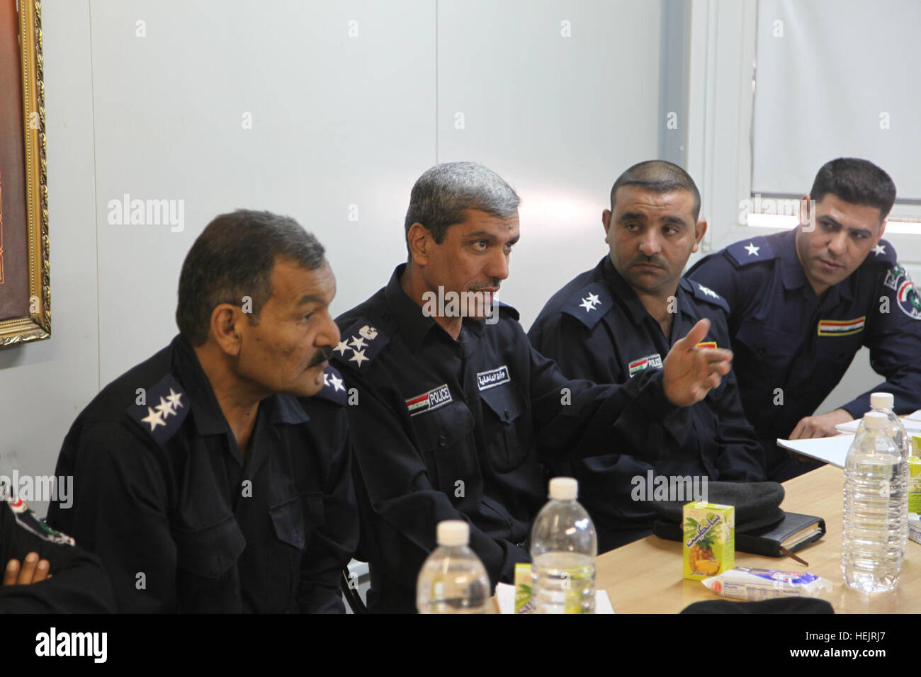 The chief of training for the Dhi Qar province police, attends a class ...