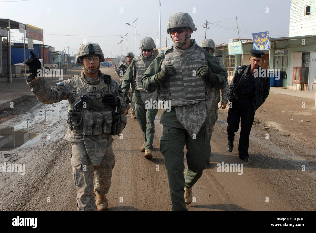 Capt. Alex Aquino (left), of Little Rock, Ark., the commander of ...