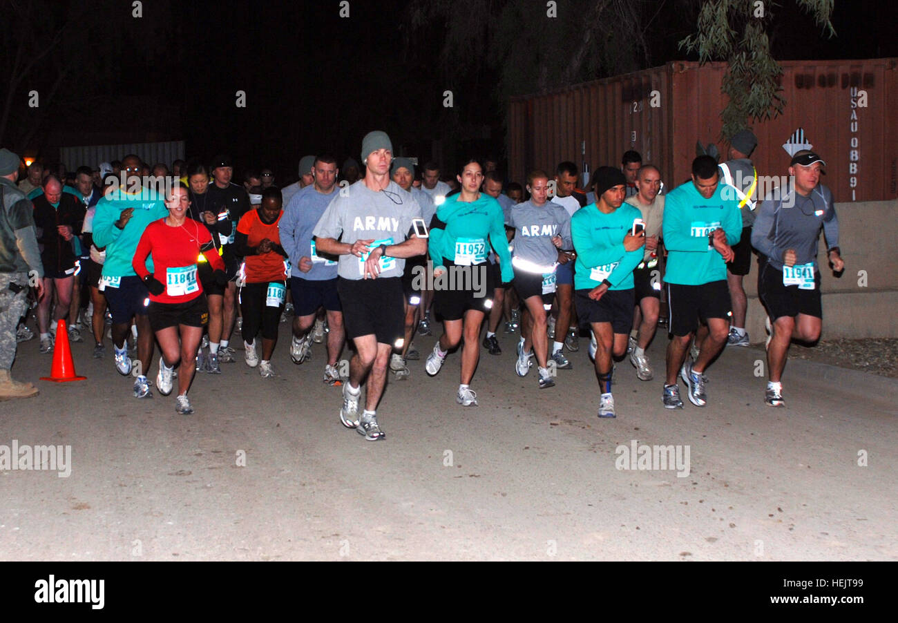 Service members take their first strides off the starting line of the ...