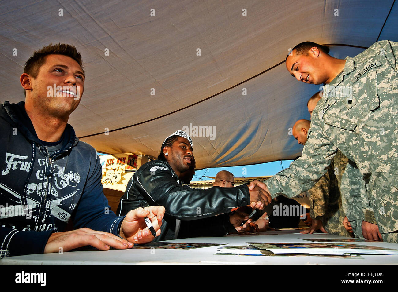 U.S. Soldiers at Camp Taji participate in a recreational wrestling ...