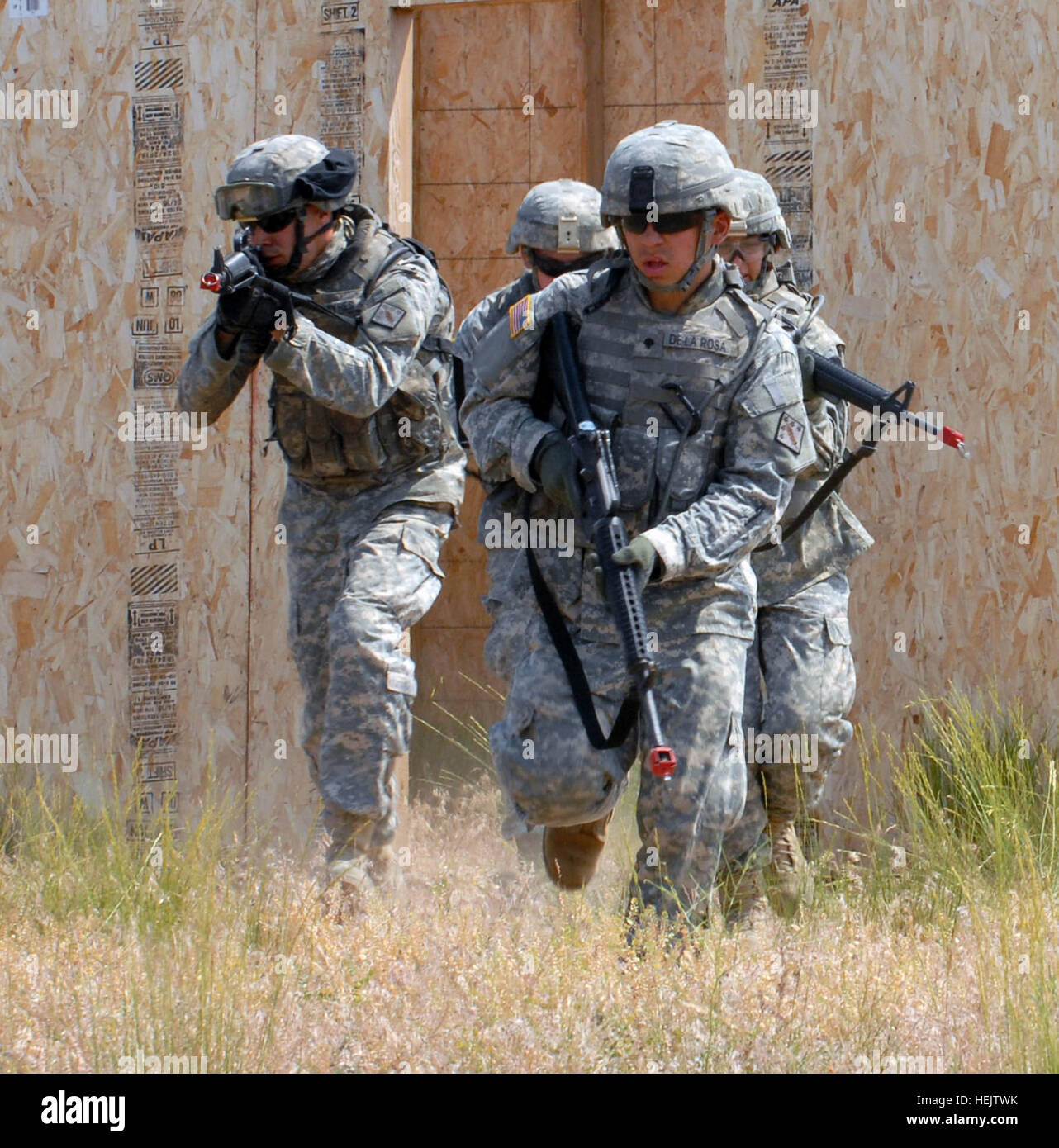 An assault team from 1st platoon, 62nd Chemical Company, 23rd Chemical ...