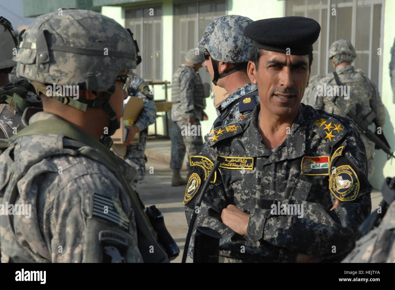 An Iraqi National Police General, and Maj. Arnel David, Team Chief of ...