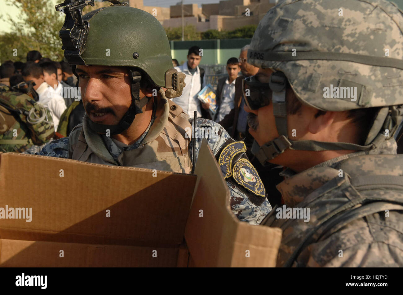 Iraqi National Policeman and U.S. Soldiers from the 30th Heavy Brigade ...