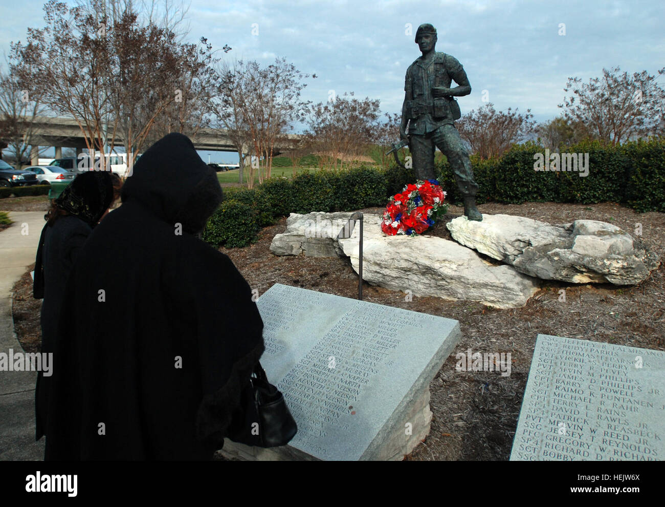 A widow looks on at the names of the fallen Soldiers lost in Arrow ...