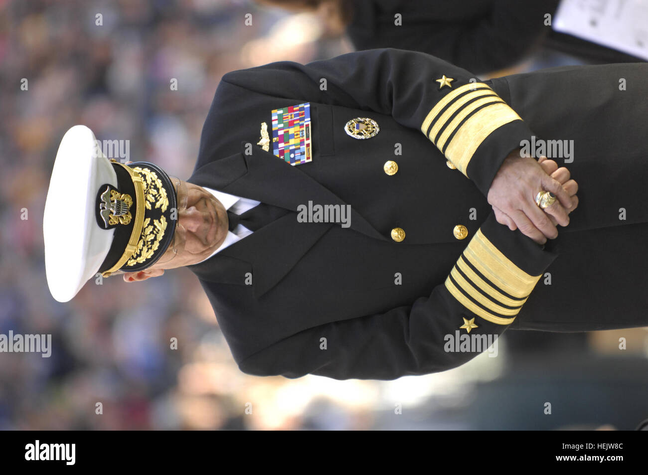 U.S. Navy Admiral Mike Mullen bows his head in prayer during the ...