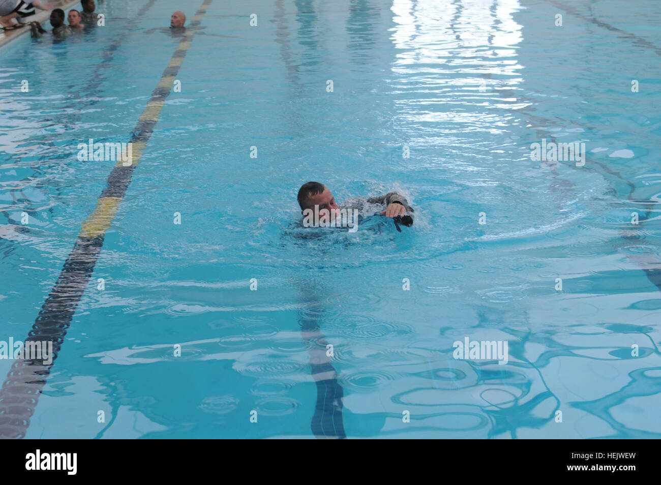 Spc. Christopher Arnold, engineer, 336th Engineer Company, swims across ...