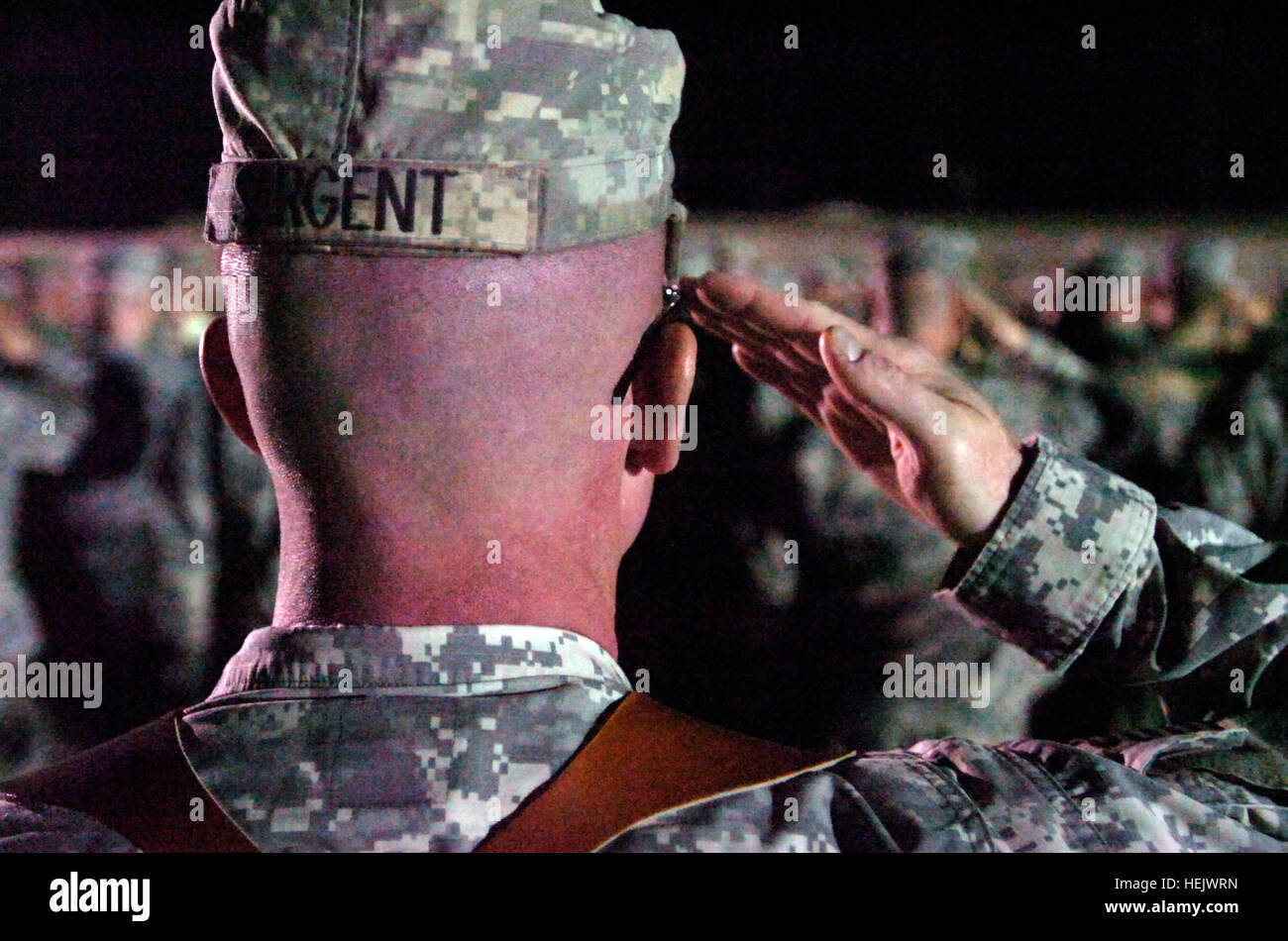 A U.S. Soldier, attached to the 252nd Military Police Company, renders ...