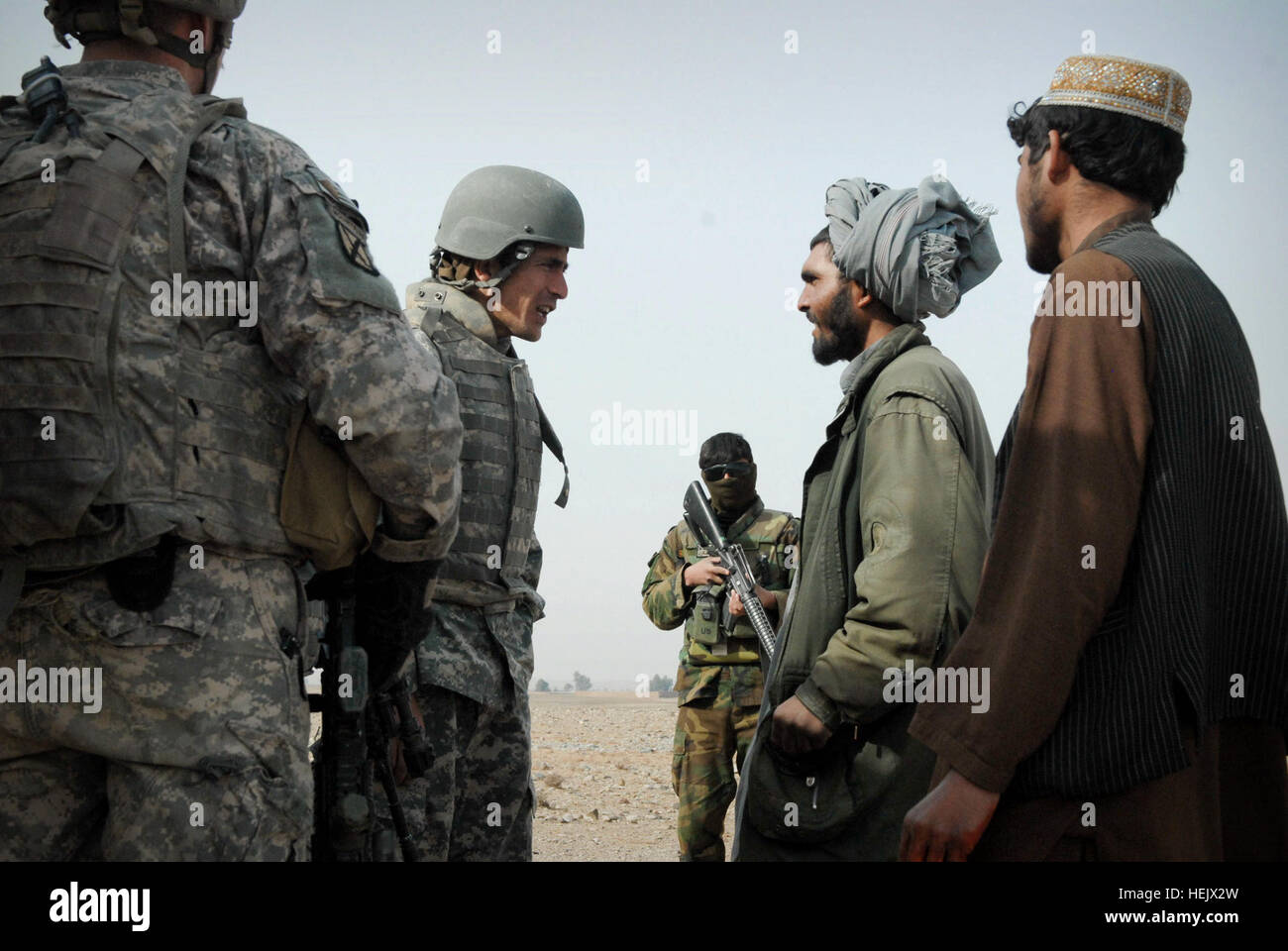 U.S. Army 5th Stryker Brigade Combat Team personnel, assisted by ...