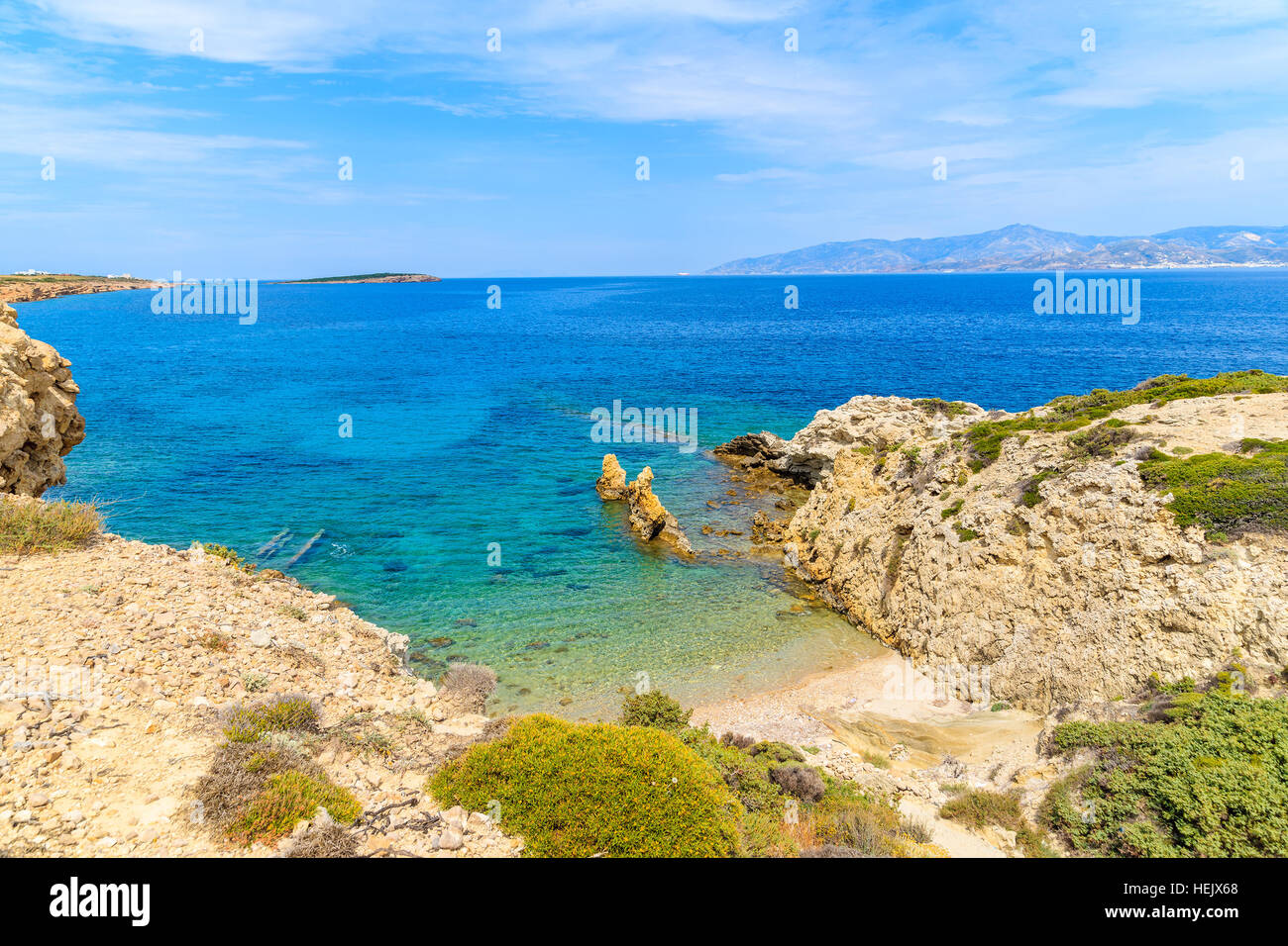 View of beautiful small bay with azure sea water on coast of Paros ...