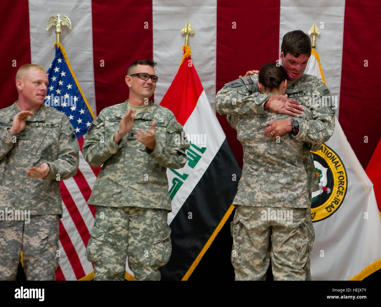 Capt. Sam Brown hugs his wife Capt. Amy Brown after arriving in Baghdad ...