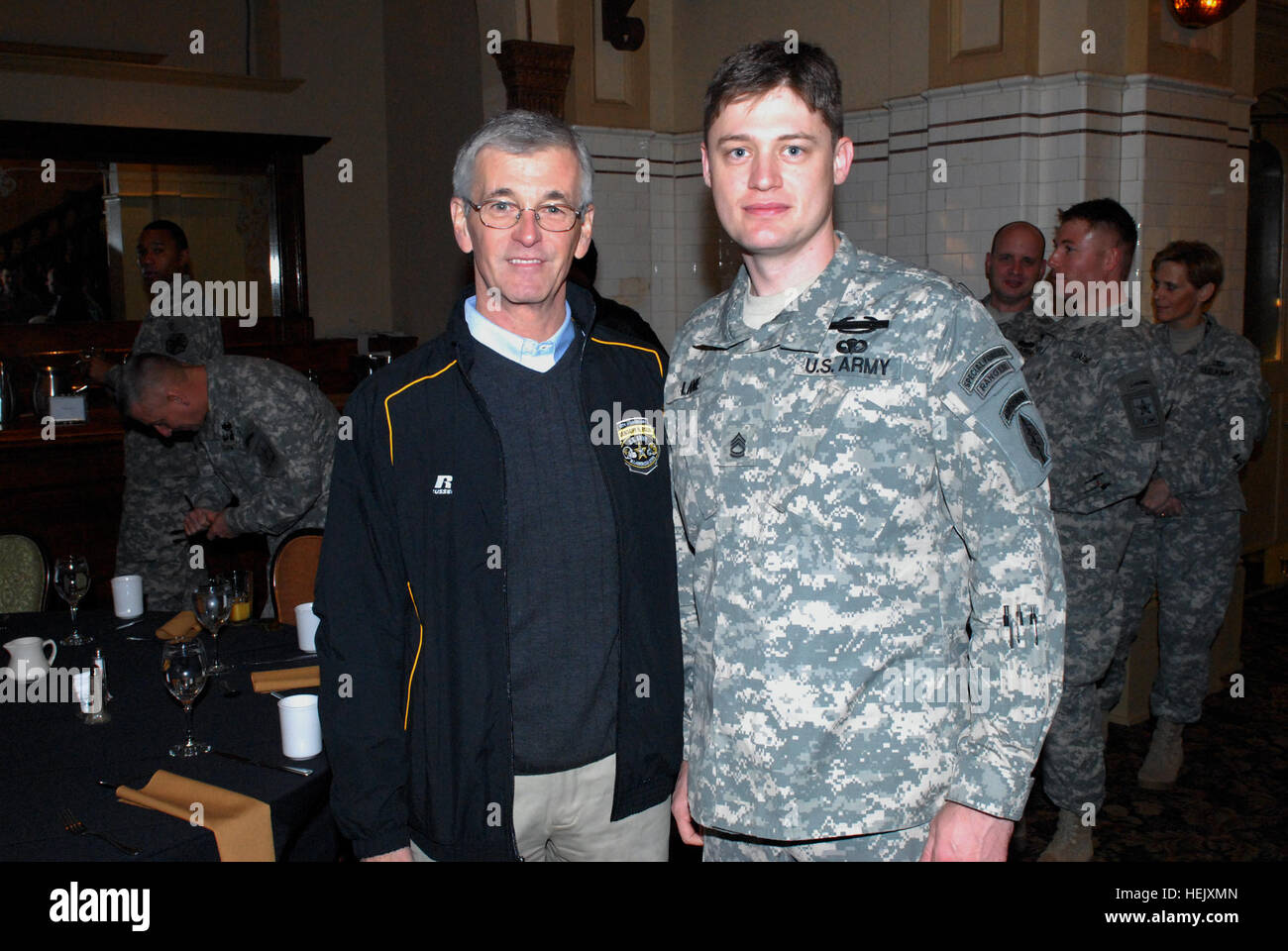 John McHugh, Secretary of the Army, congradulates SFC Andrew Lane ...