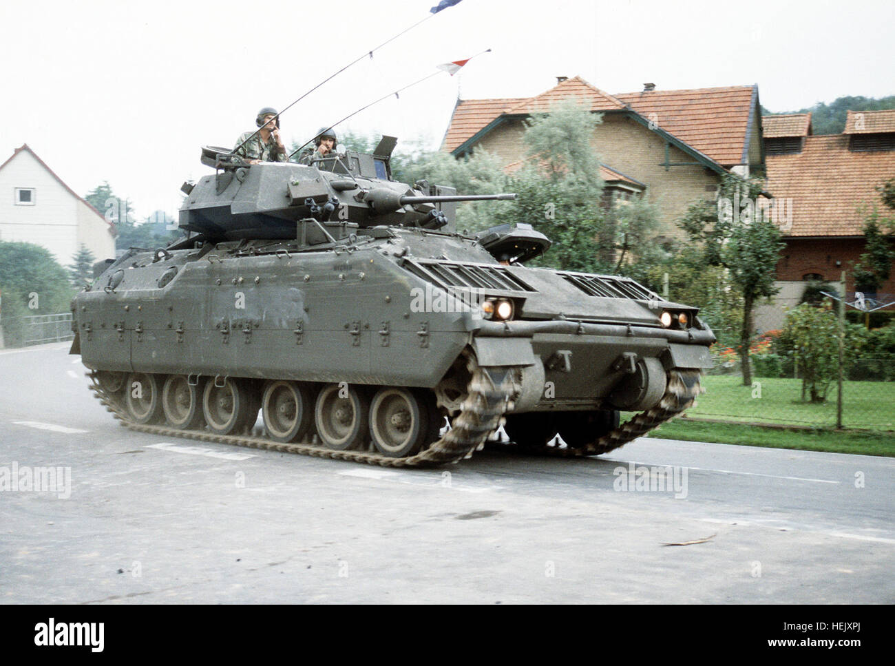 A right side view of an M2 Bradley infantry fighting vehicle moving ...