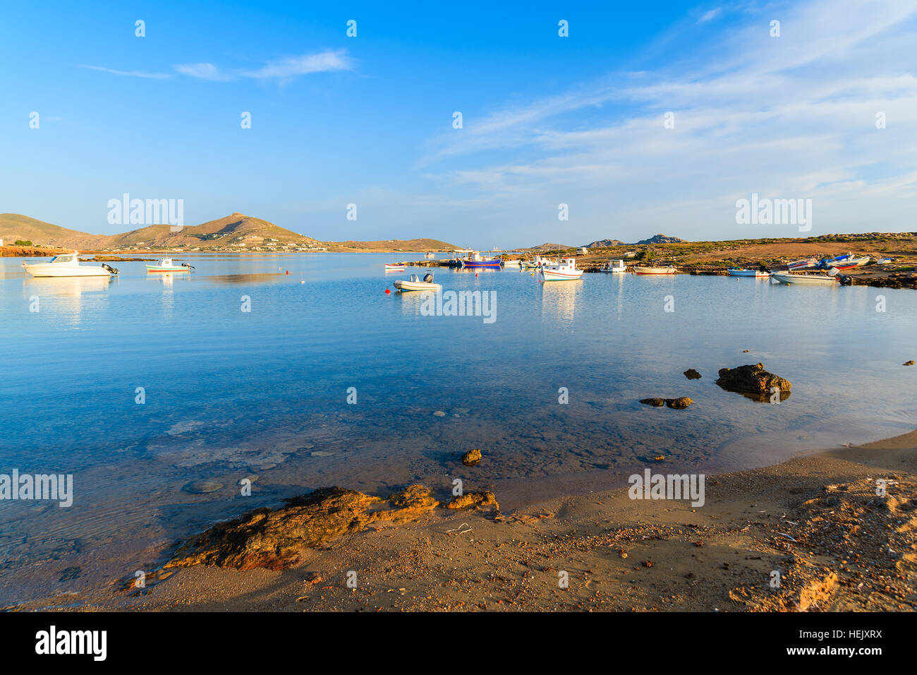 A view of beach in Naoussa village at sunrise time, Paros island ...