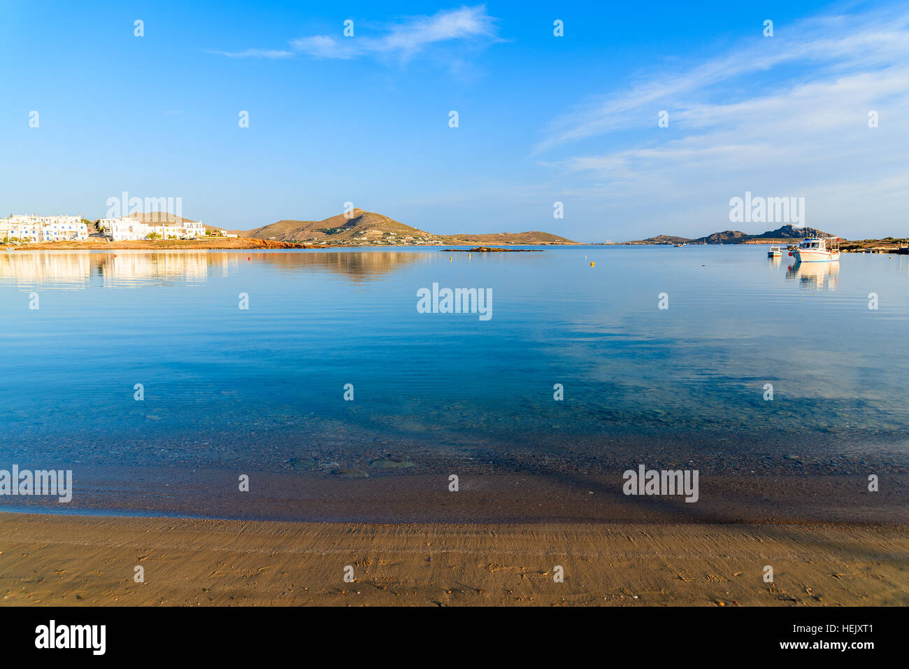 A view of beach in Naoussa village at sunrise time, Paros island ...