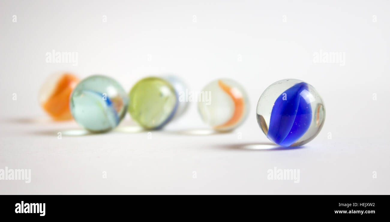 Colorful Marbles With Focus on One Stock Photo - Alamy