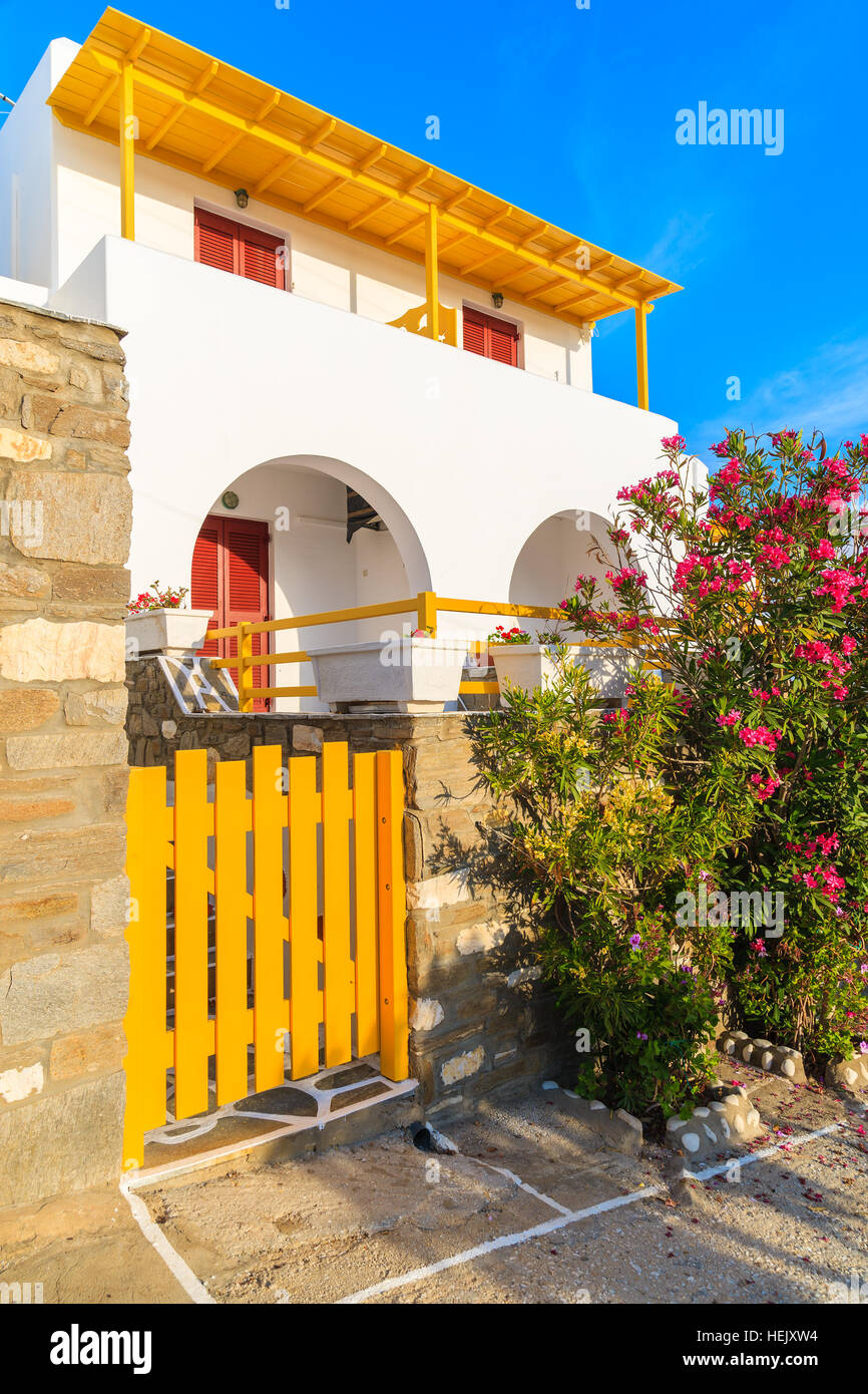 Yellow gate of a typical Greek house in Naoussa village on Paros island ...