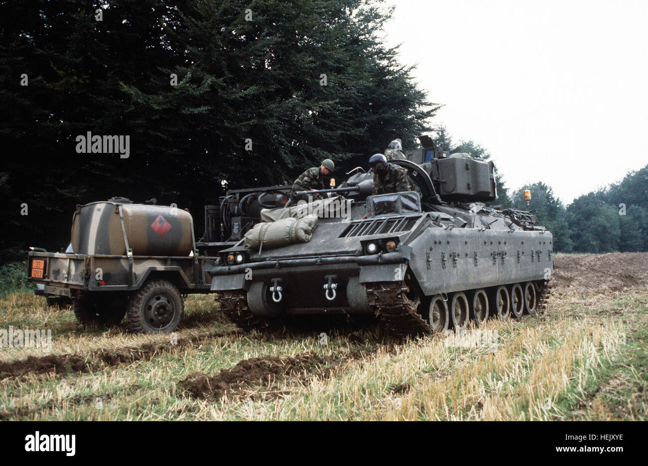 An M2 Bradley infantry fighting vehicle refuels in the field during ...