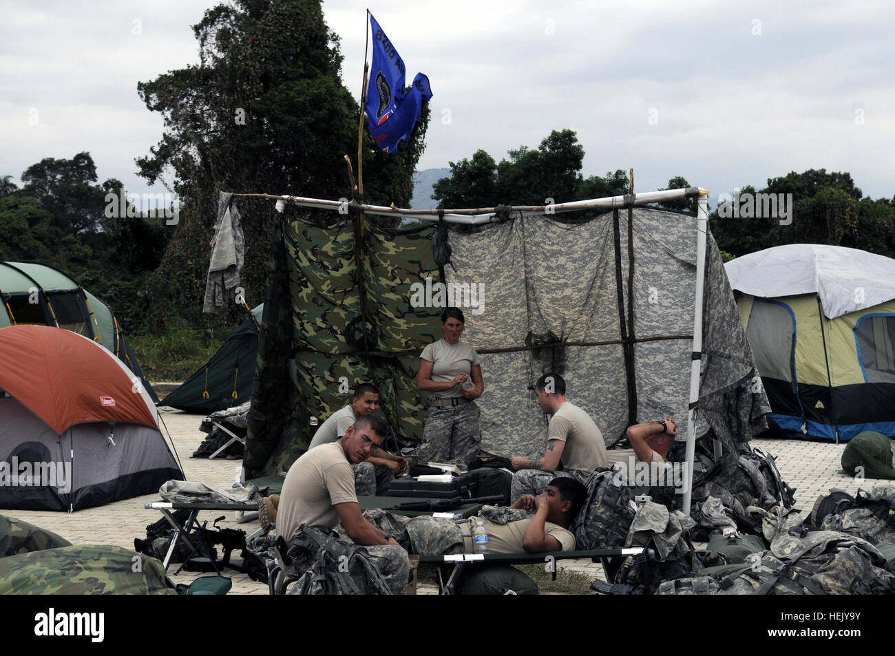 Members of the 2nd BCT, 82nd Airborne Division take a rest break after ...
