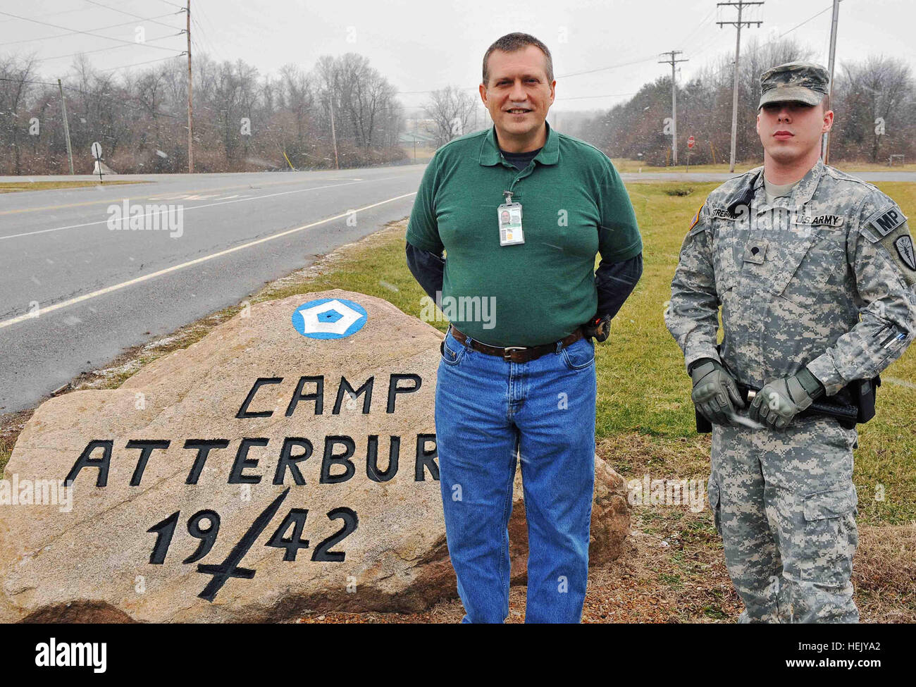Civilian contractor Mark Trowbridge stands with Military Police Officer ...