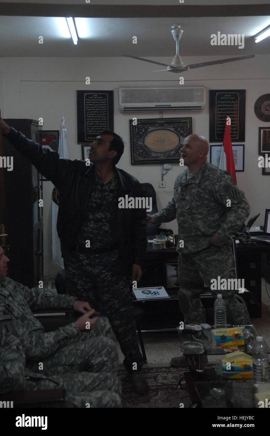The commander of the 5-2 Federal Police Brigade, shows an award given ...