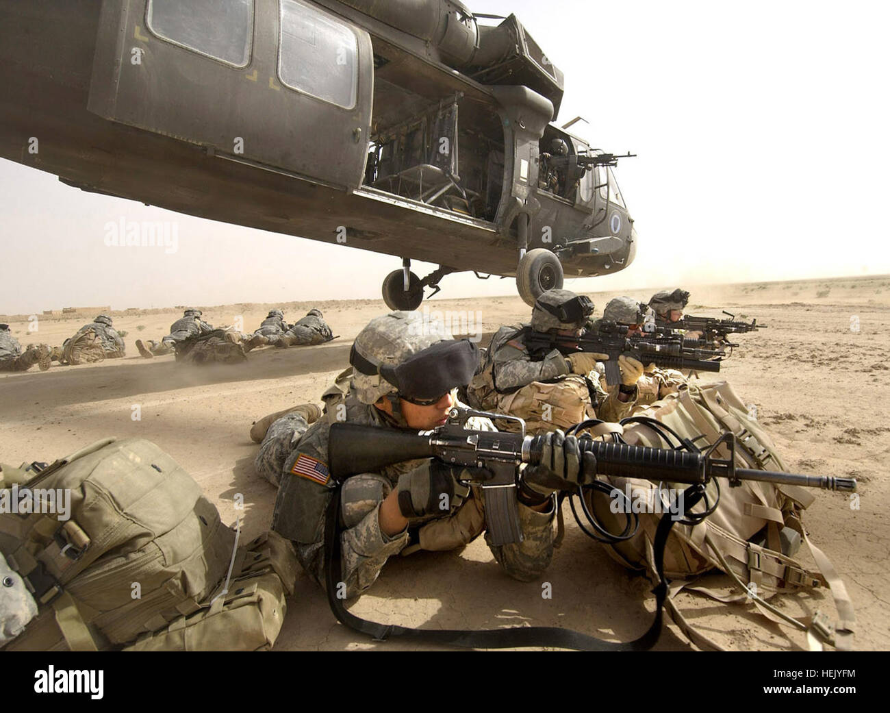 U.S. Army Soldiers from the 1st Brigade, 1st Armored Division dismount ...