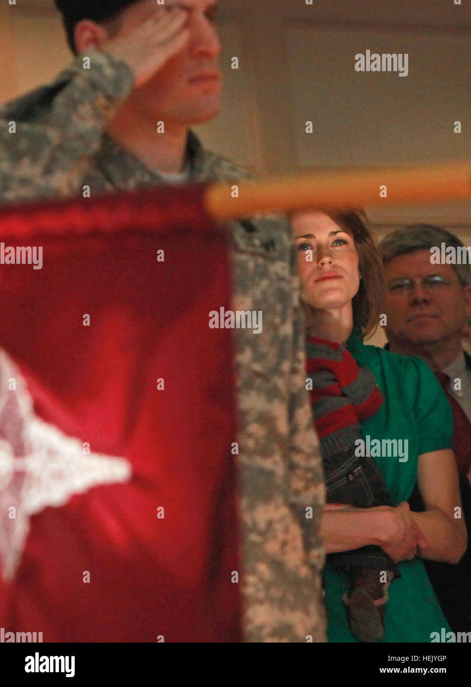 Tiffany Smiley holds her youngest son while watching her husband Capt ...