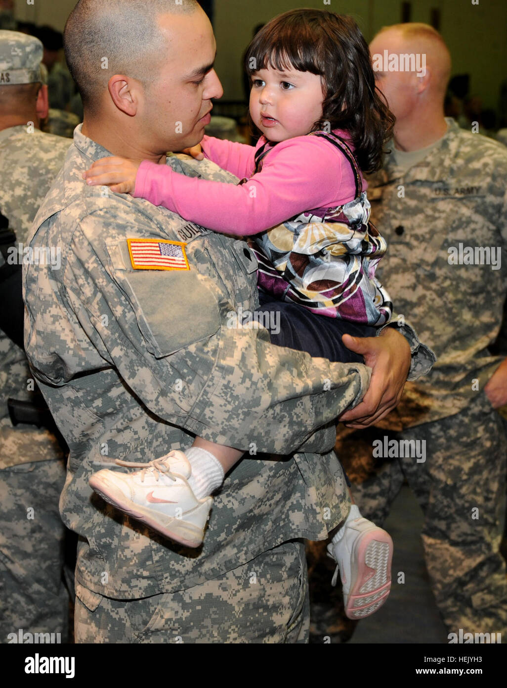 A Soldier from E Btry., 1st Battalion, 44th ADA Regt., says goodbye to ...