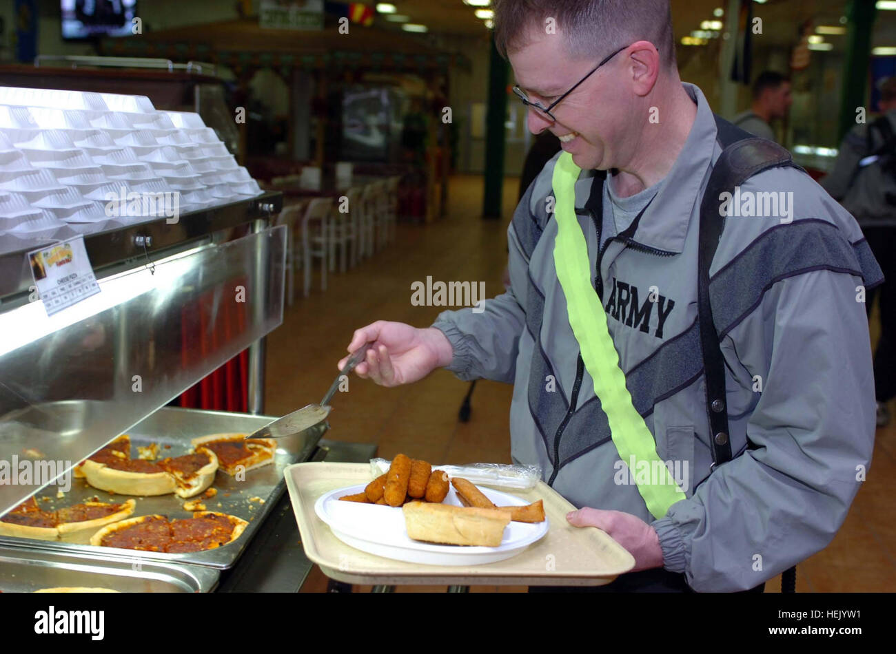 Lt. Col. Louis Birdsong with U.S. Forces Iraq JAG serves himself up a ...