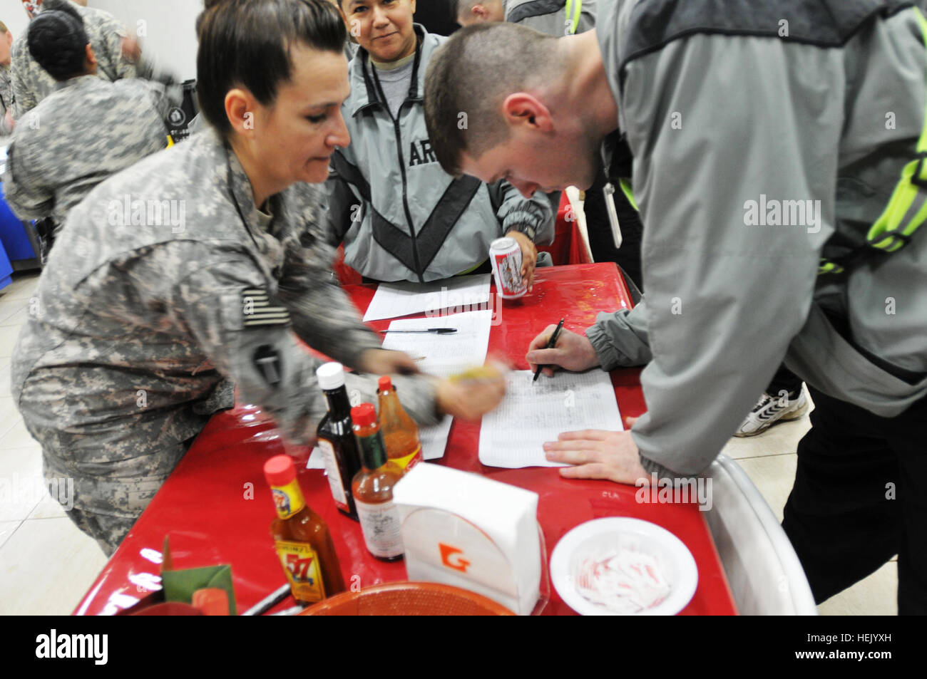 In this image released by the Texas Army National Guard, groggy-eyed ...